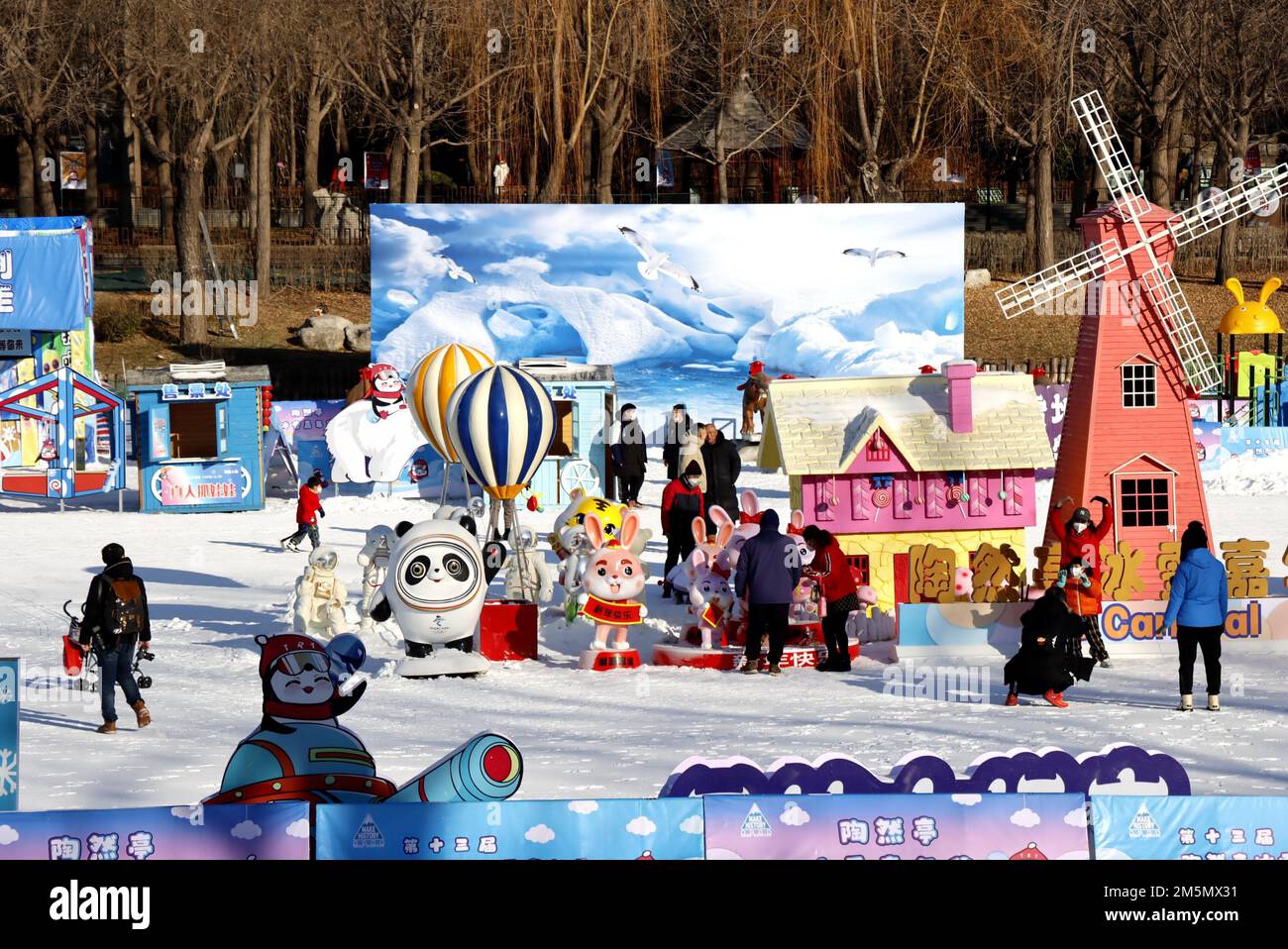 People play at the 13th Taoranting Ice Carnival kicked off in Beijing ...