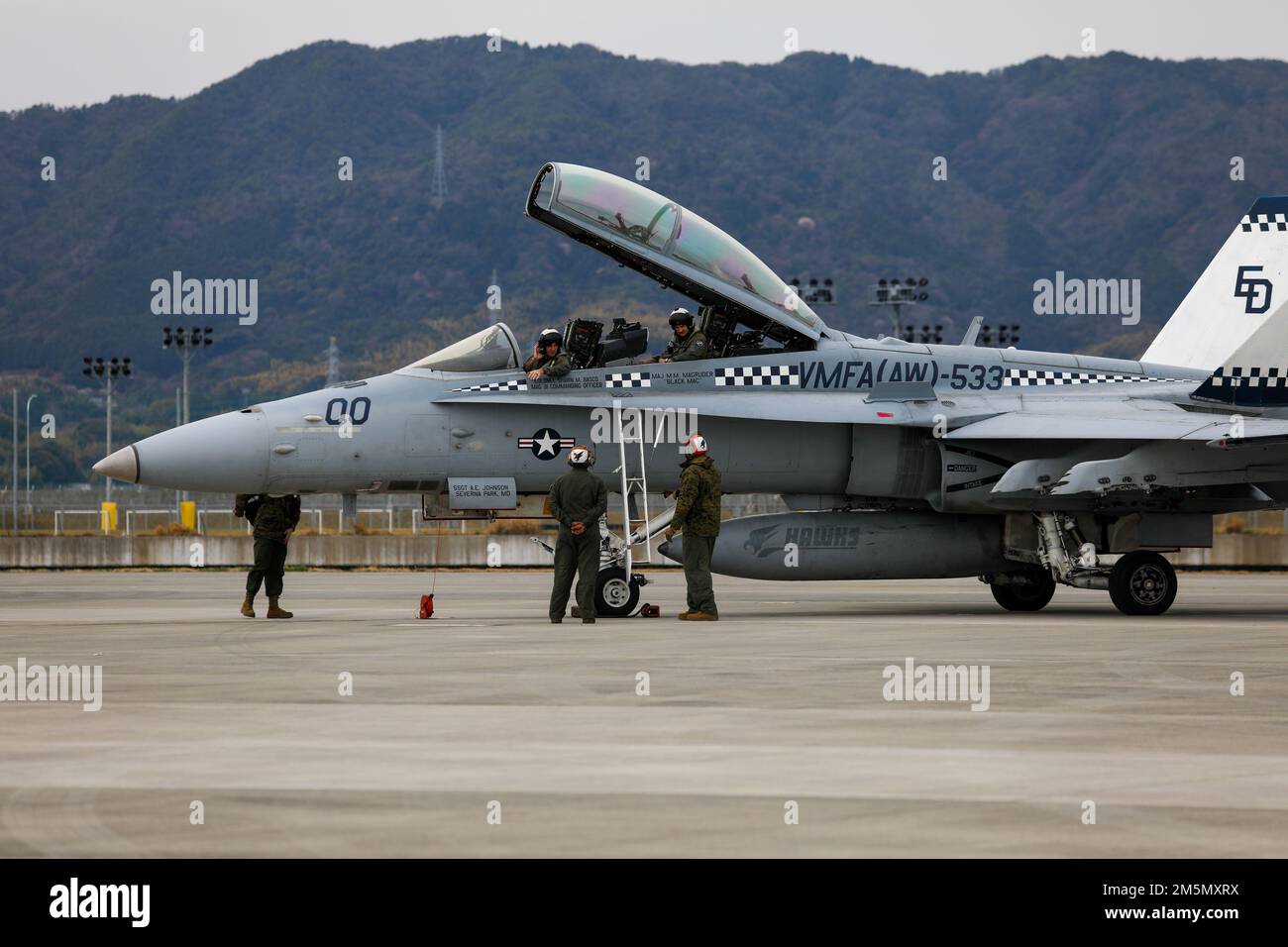 A U.S. Marine Corps F/A-18 Hornet with Marine All Weather Fighter ...