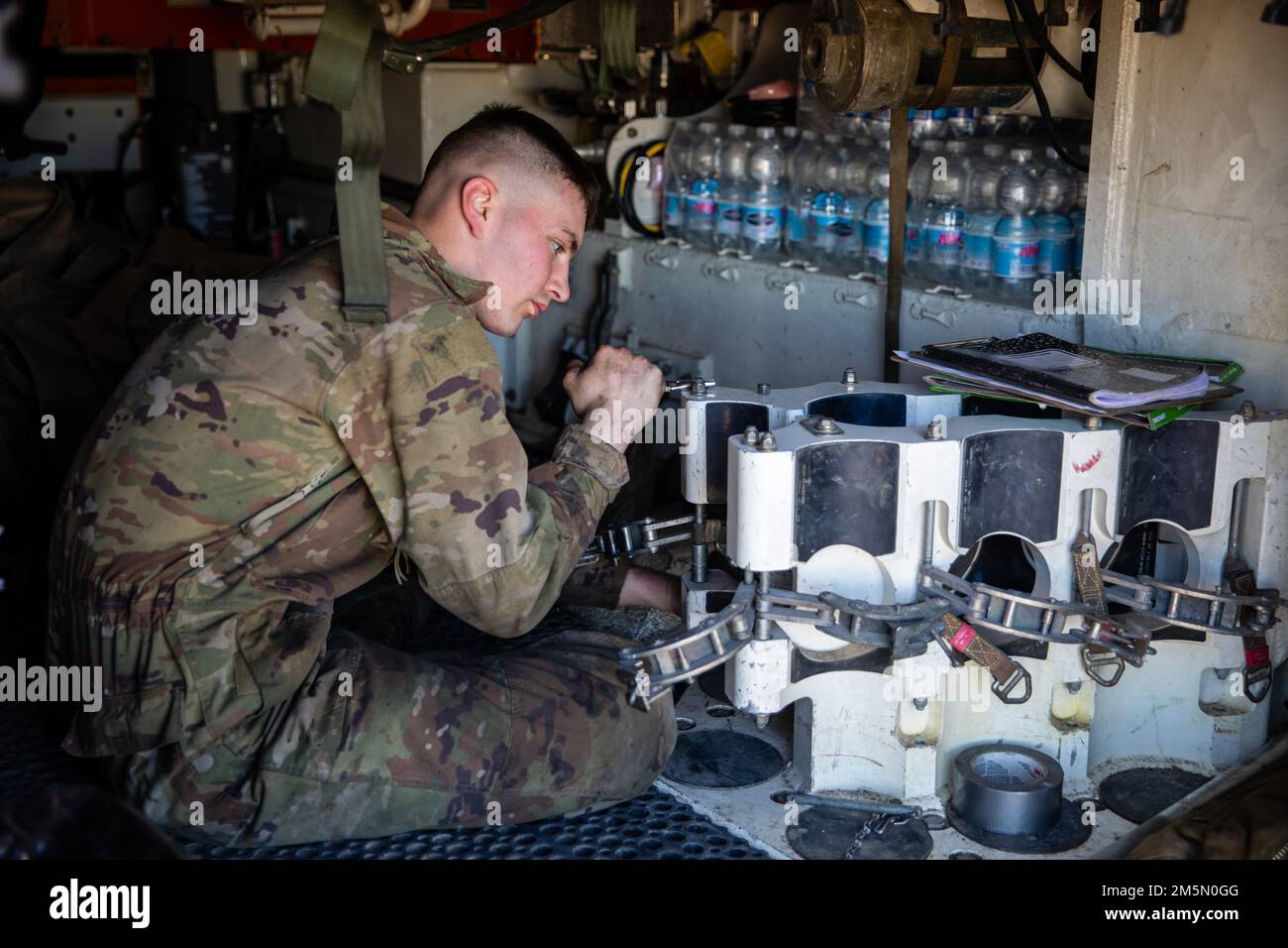 Pfc. Nicholas D. Snyder, an artillery mechanic assigned to the 1st ...