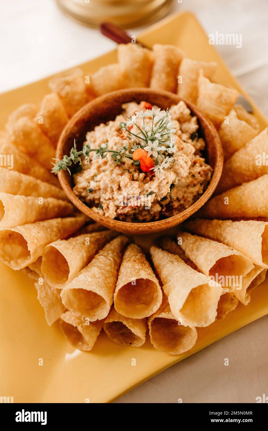 A top view of cone crackers served with sauce for a banquet Stock Photo - Alamy