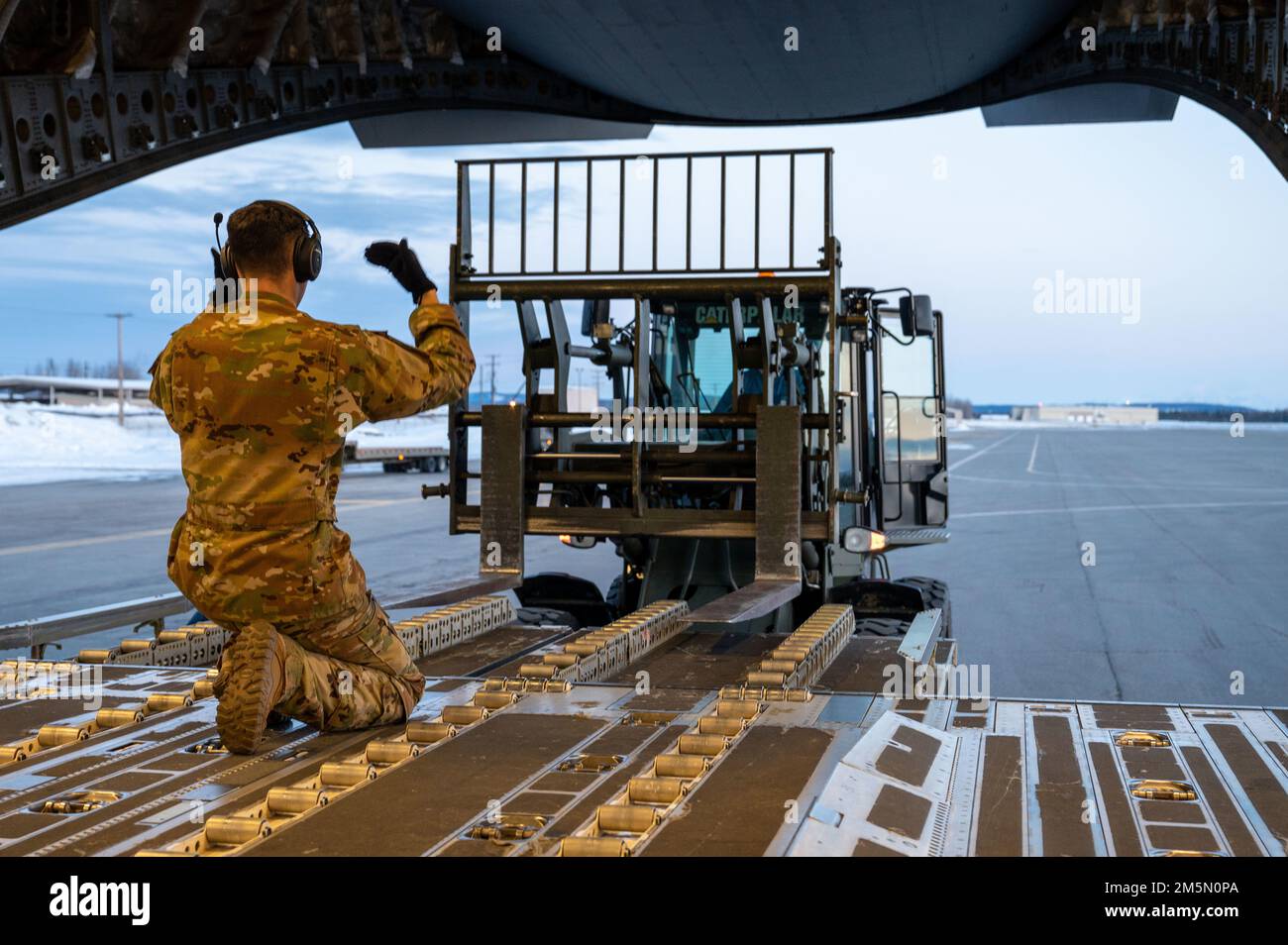 U.S. Air Force Airman 1st Class Ben Longyear, a 517th Airlift Squadron ...