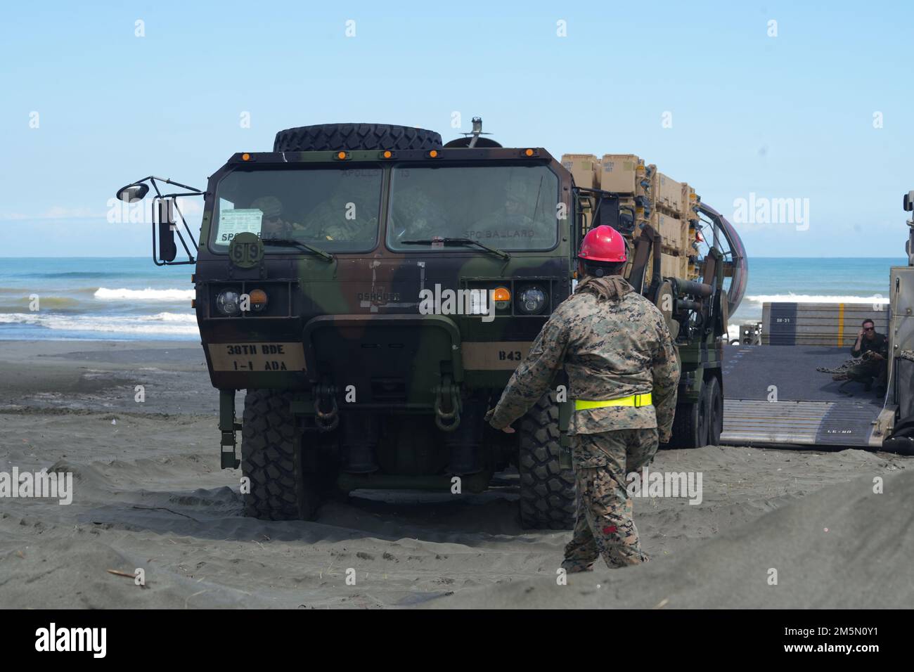 A U.S. Marine with 9th Engineer Support Battalion, 3d Marine Logistics ...