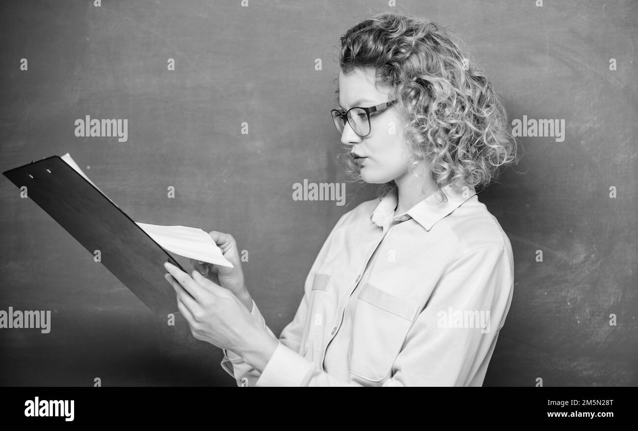 essay writing. teacher with document folder. student in glasses at ...
