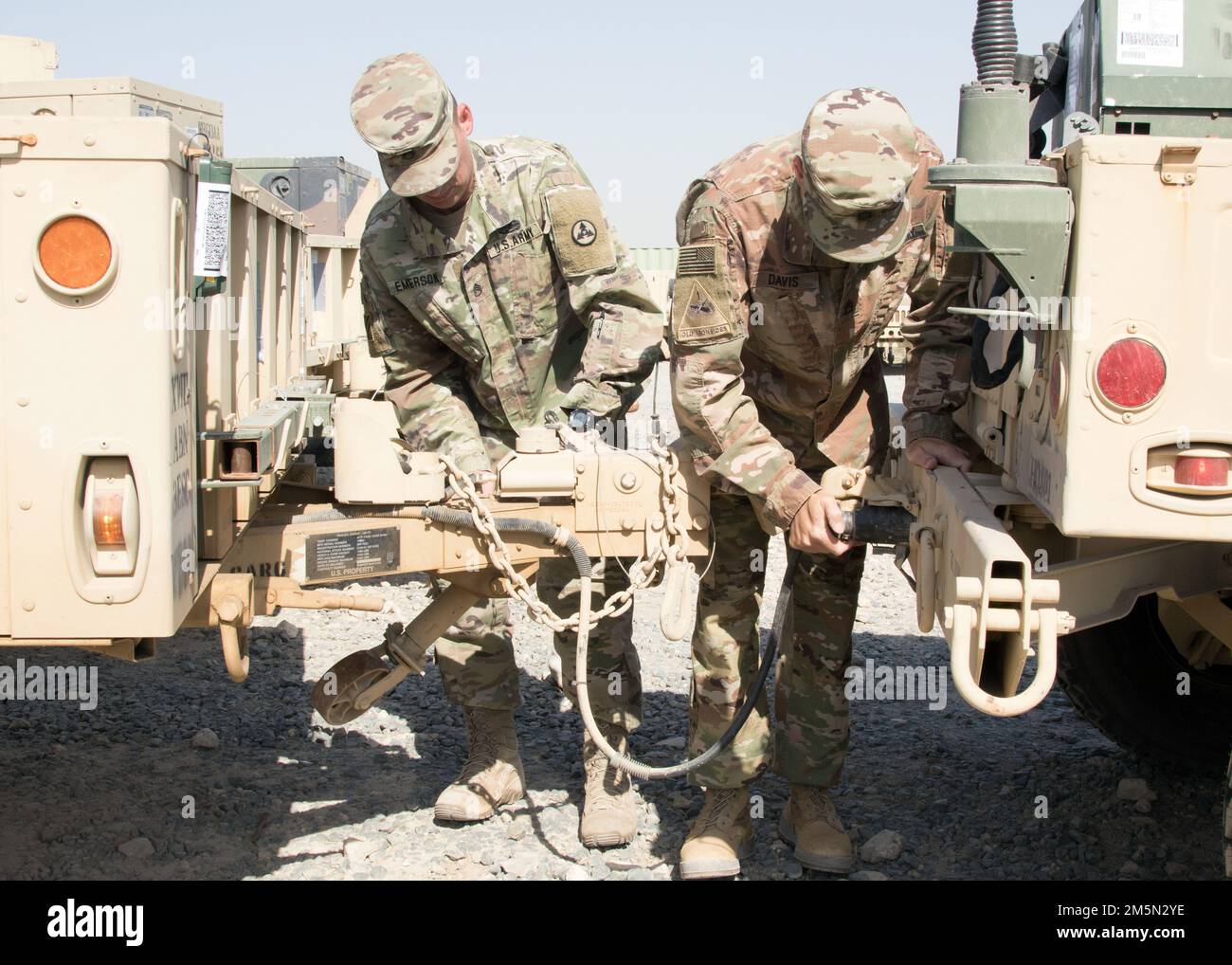 Staff Sgt. Robert T. Emerson, left, and Sgt. 1st Class Ryland G. Davis ...