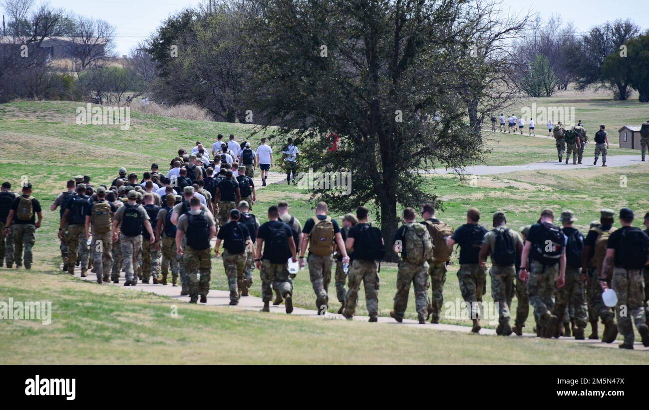 Participants in a Sheppard NCO Academy 5k ruck make their way through ...