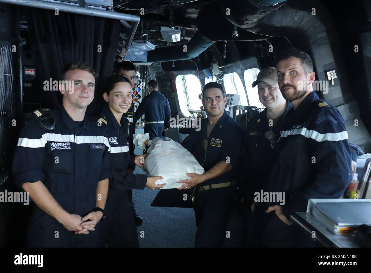 220328-O-NR876-413 PHILLIPPINE SEA (March 28, 2022) – Sailors from the ...