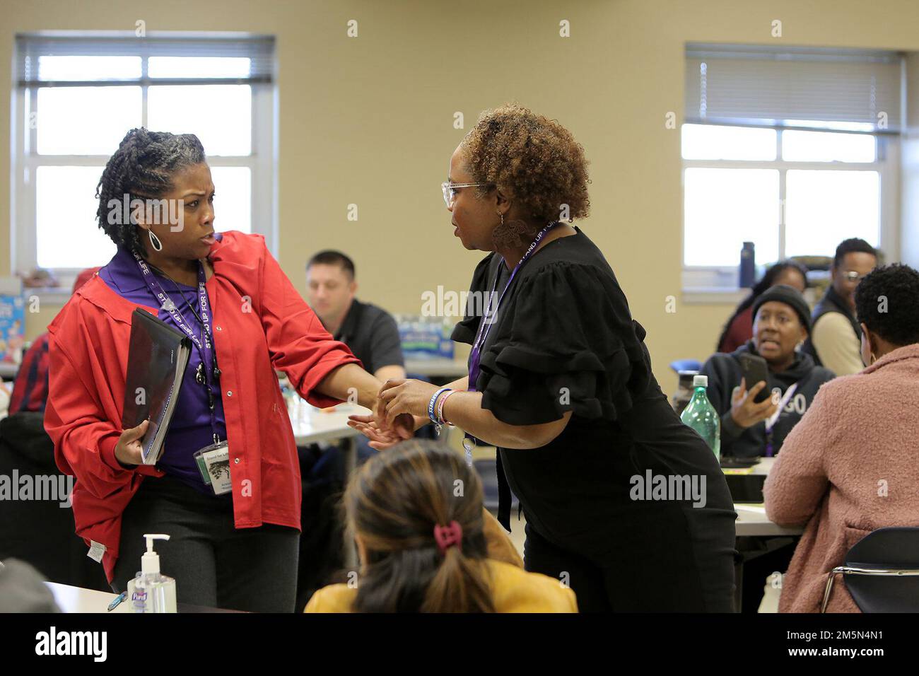 Ariesa Evans, left, assigned to the 85th U.S. Army Reserve Support ...