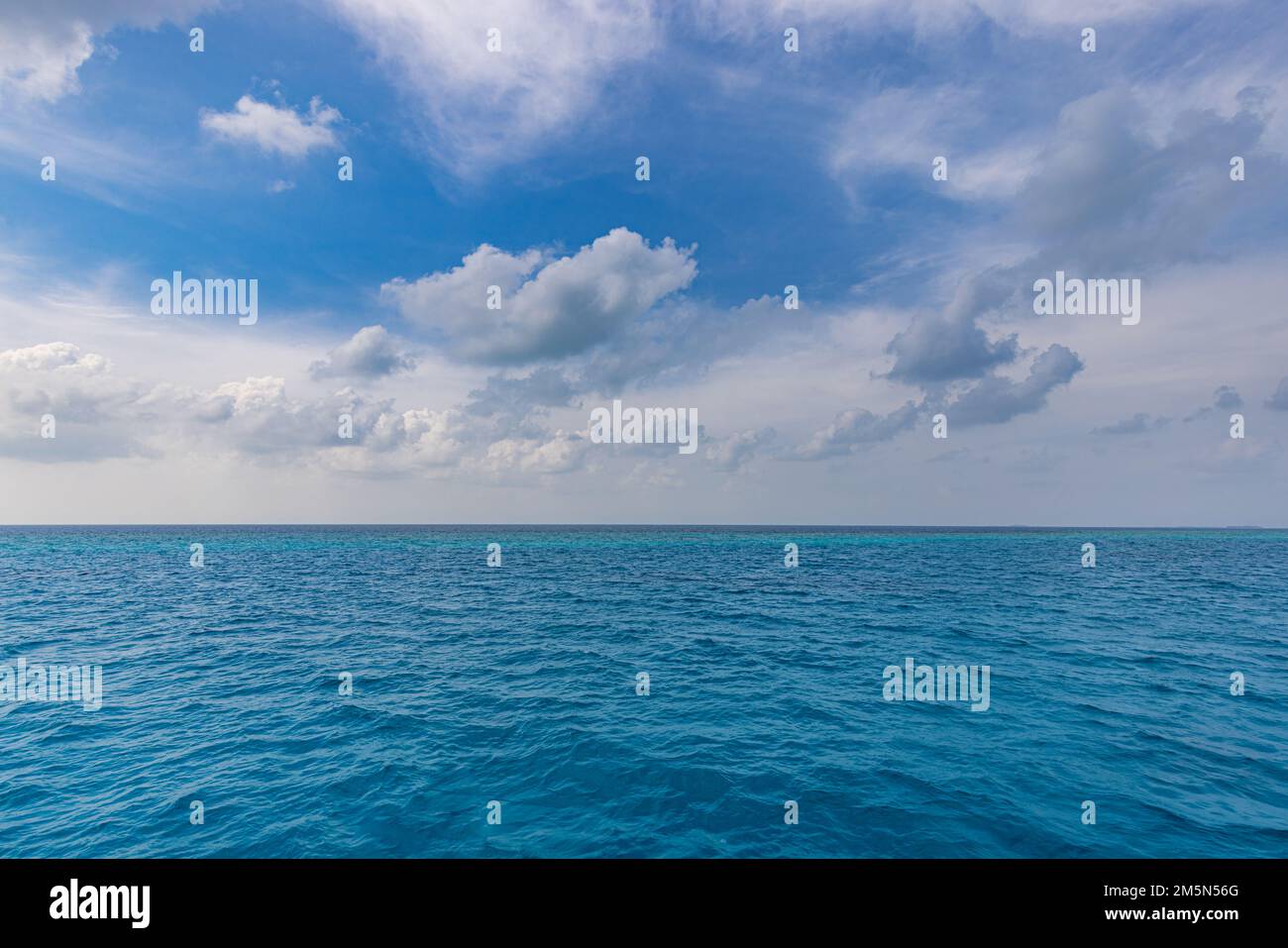 Crystal clear sea water bay. Pristine ocean lagoon sunny cloudy sky ...