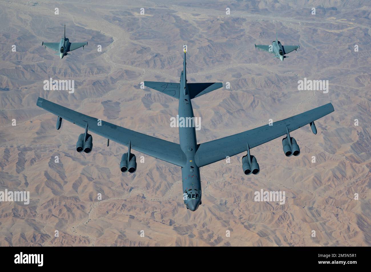 A U.S. Air Force B-52H Stratofortress flies alongside Royal Air Force ...