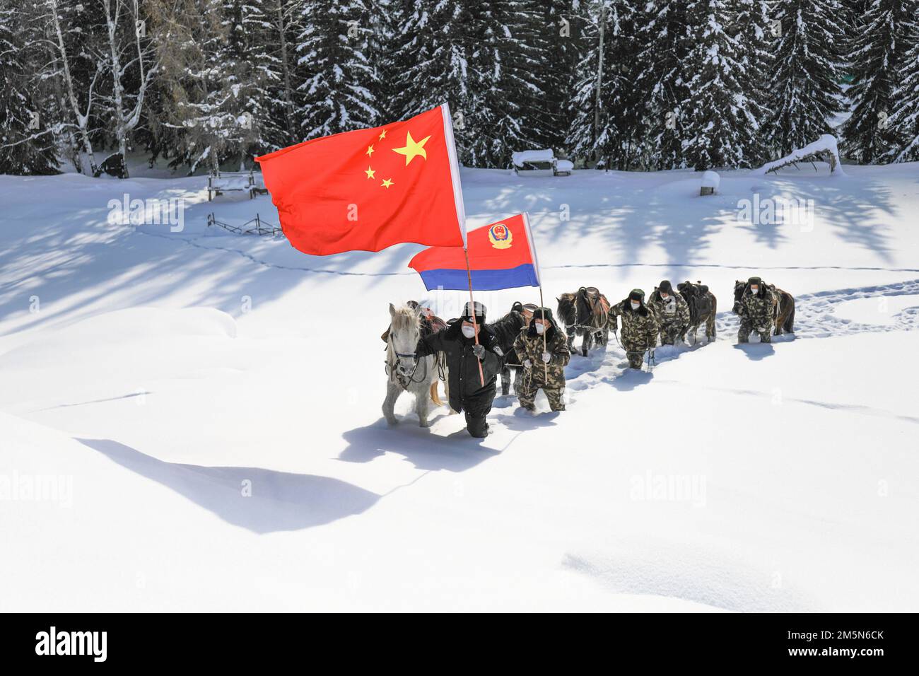 ALTAY, CHINA - DECEMBER 30, 2022 - Police officers and border guards ...