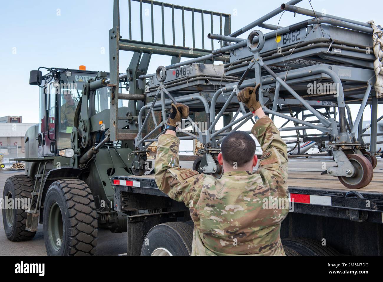 U.S. Airmen assigned to the 773d Logistics Readiness Squadron establish ...