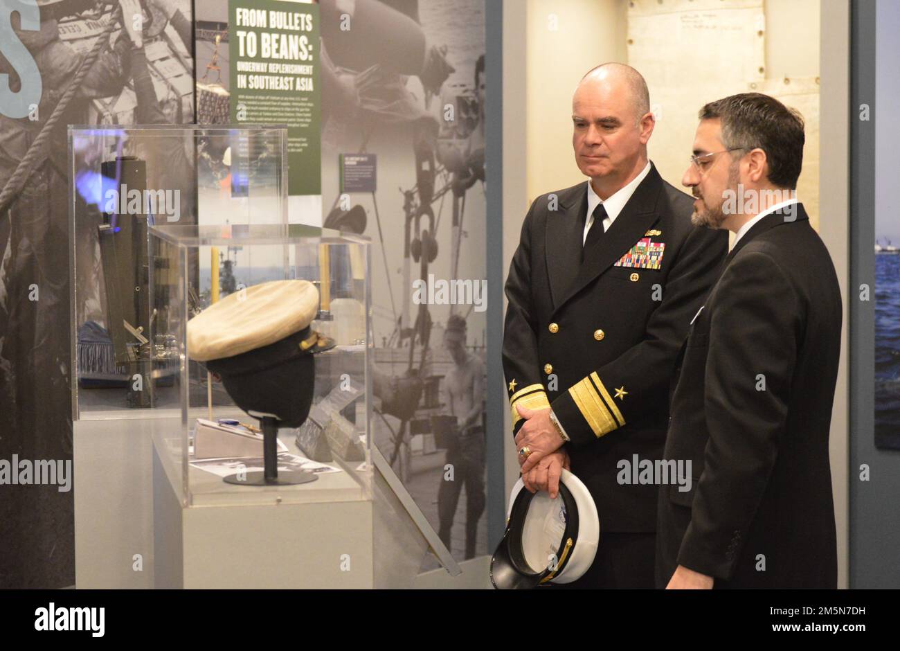 Museum Director John Pentangelo of the Hampton Roads Naval Museum (right) and Rear Admiral ...