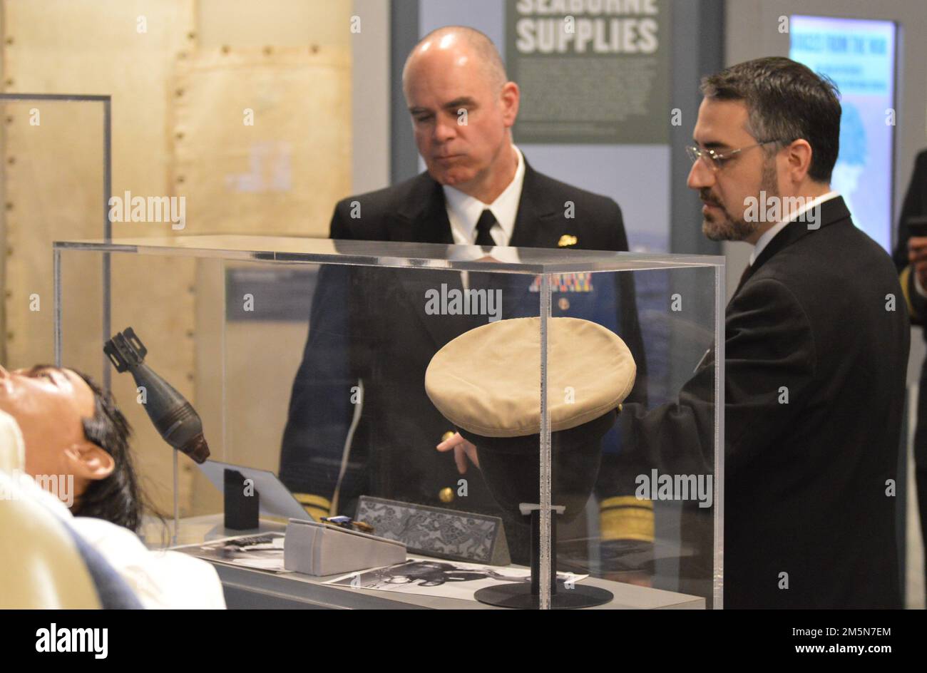 Museum Director John Pentangelo of the Hampton Roads Naval Museum (right) and Rear Admiral ...