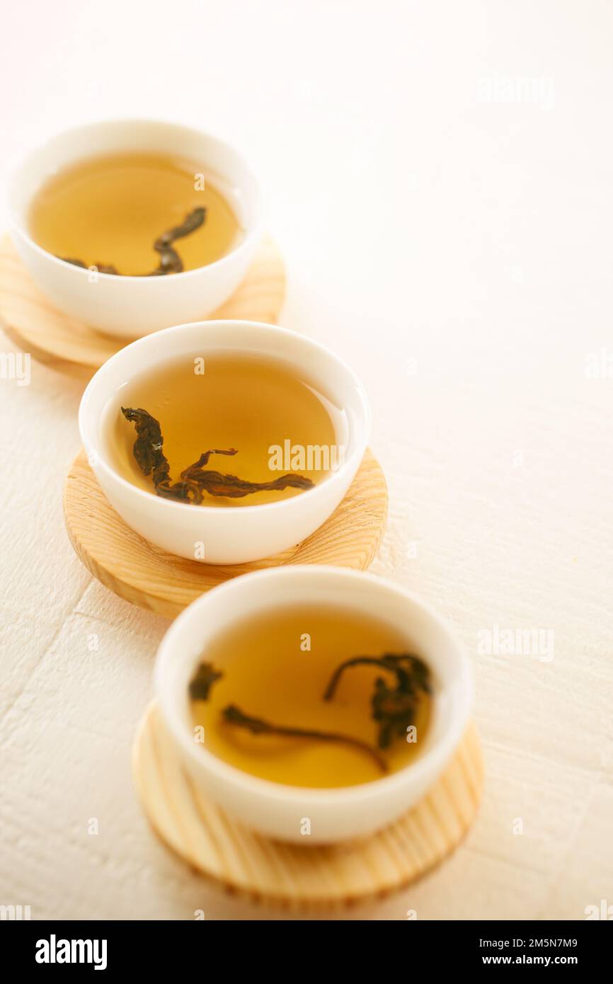 Puer tea in a traditional teacup Stock Photo - Alamy