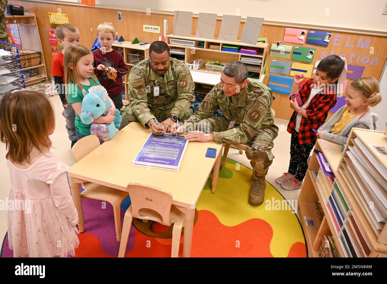 Chief Master Sgt. Raymond Riley (left), 75th Air Base Wing command ...