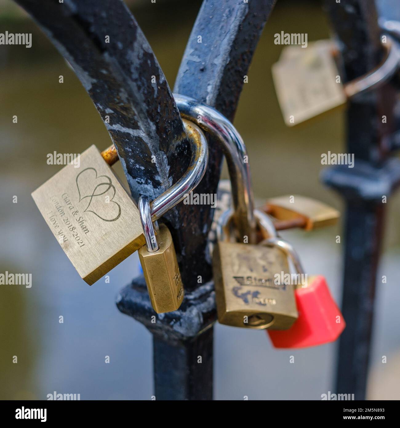 Detail of love locks on a black wrought iron fence at Camden Lock ...