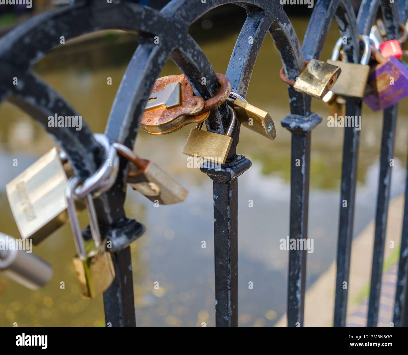 Detail of love locks on a black wrought iron fence at Camden Lock ...