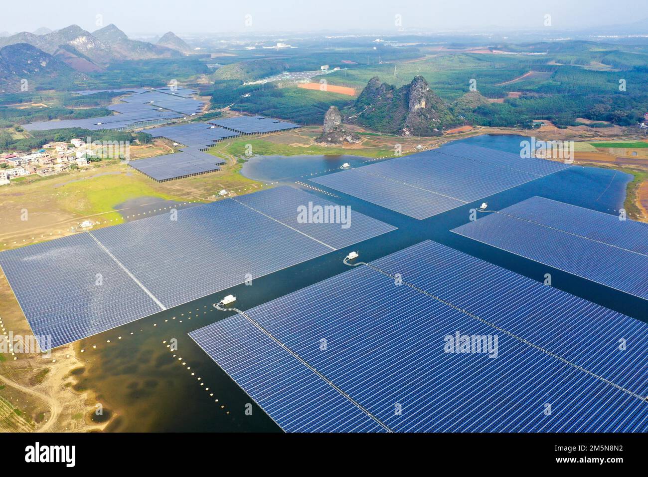 Aerial photo shows the photovoltaic power station floating on the water ...