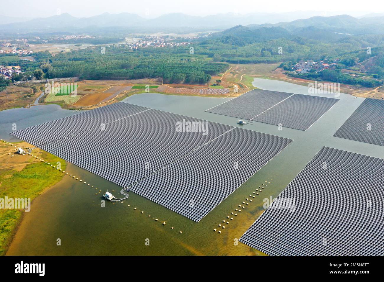 Aerial photo shows the photovoltaic power station floating on the water ...