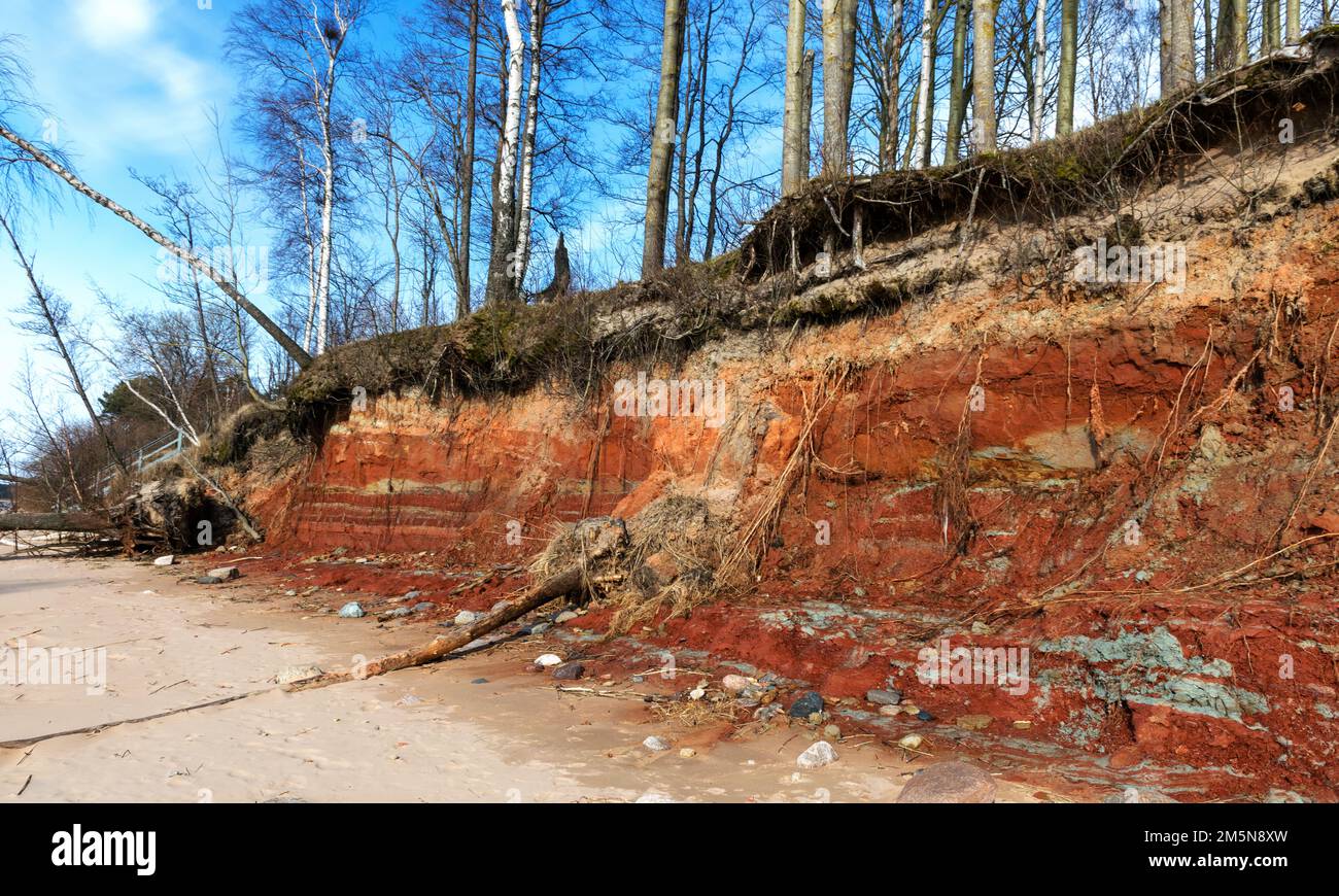 Sea, shore and sand, red clay bank, Vidzeme sea shore, Latvia, the ...