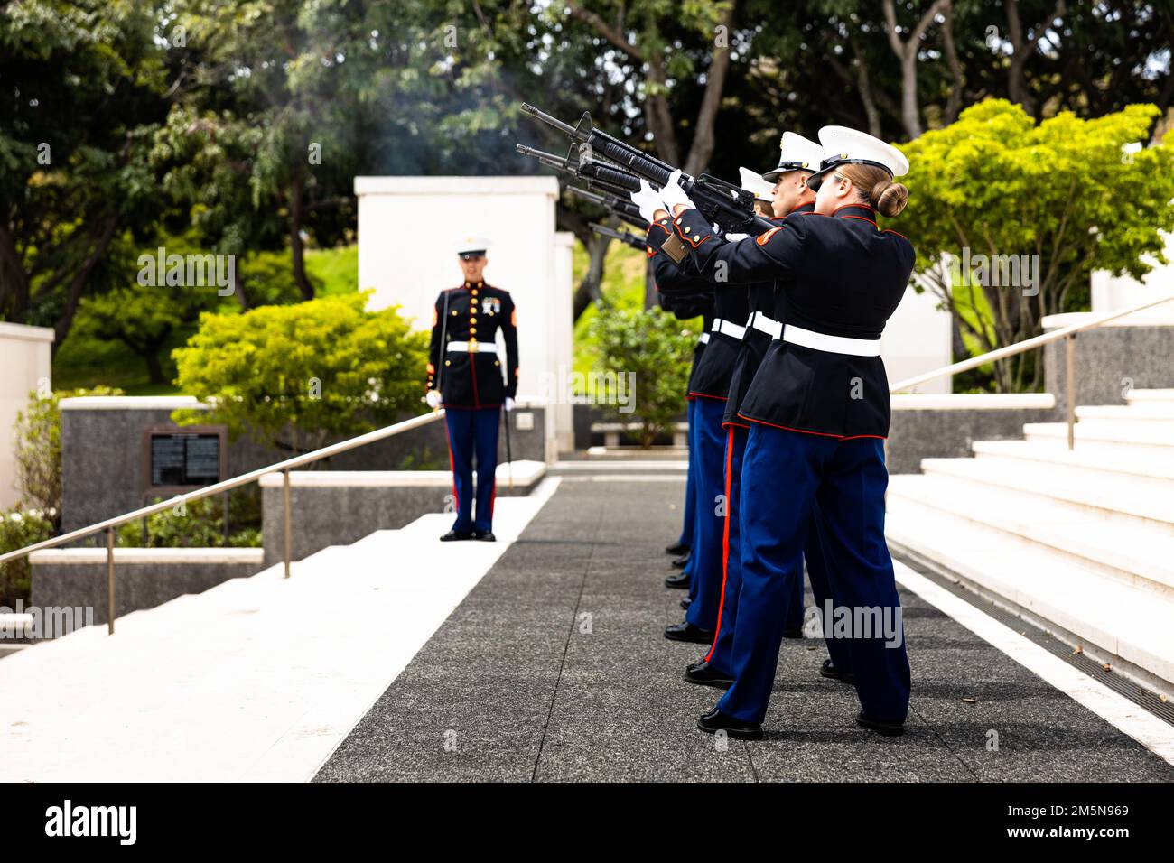 U.S. Marines with Marine Corps Base Hawaii perform a 21-gun salute ...