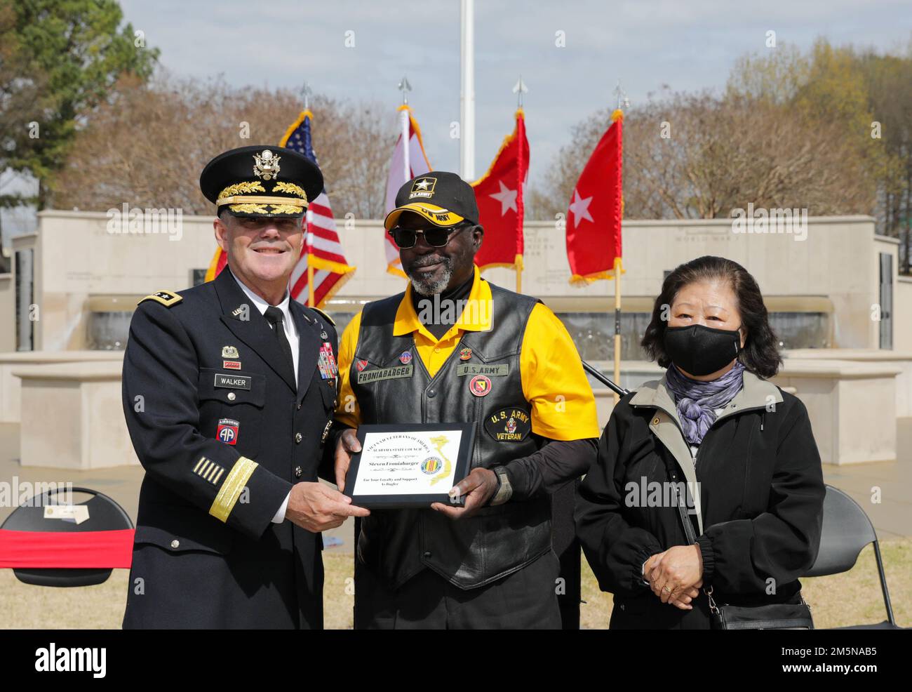 Retired Col. Steven Froniabarger receives an award from the Vietnam ...