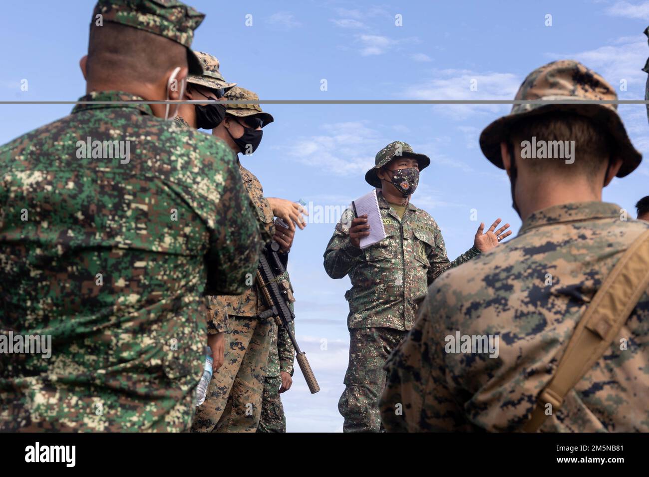 Philippine Marine Corps Maj. Tugagao, with Marine Battalion Landing Team 10, conducts a brief ...