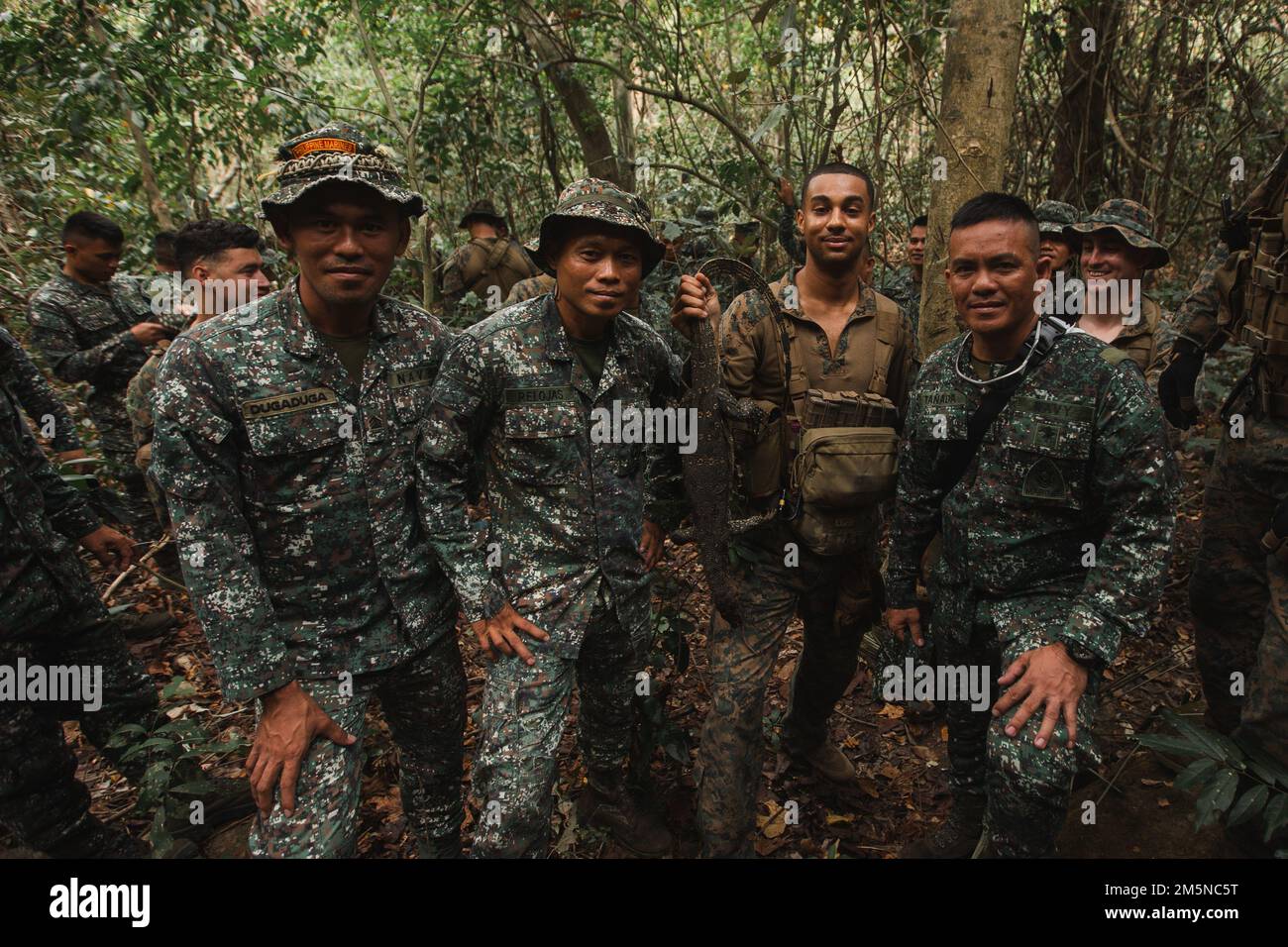 U.S. Marines with 3d Reconnaissance Battalion, 3d Marine Division, and Philippine Marines with ...