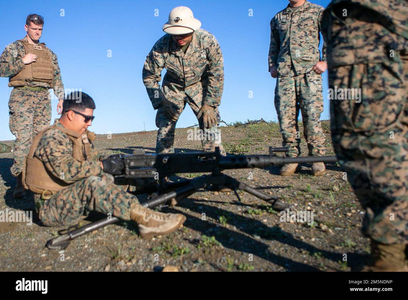 U.S. Marine Corps Lance Cpl. Jesus Aguilar, a combat marksmanship coach ...