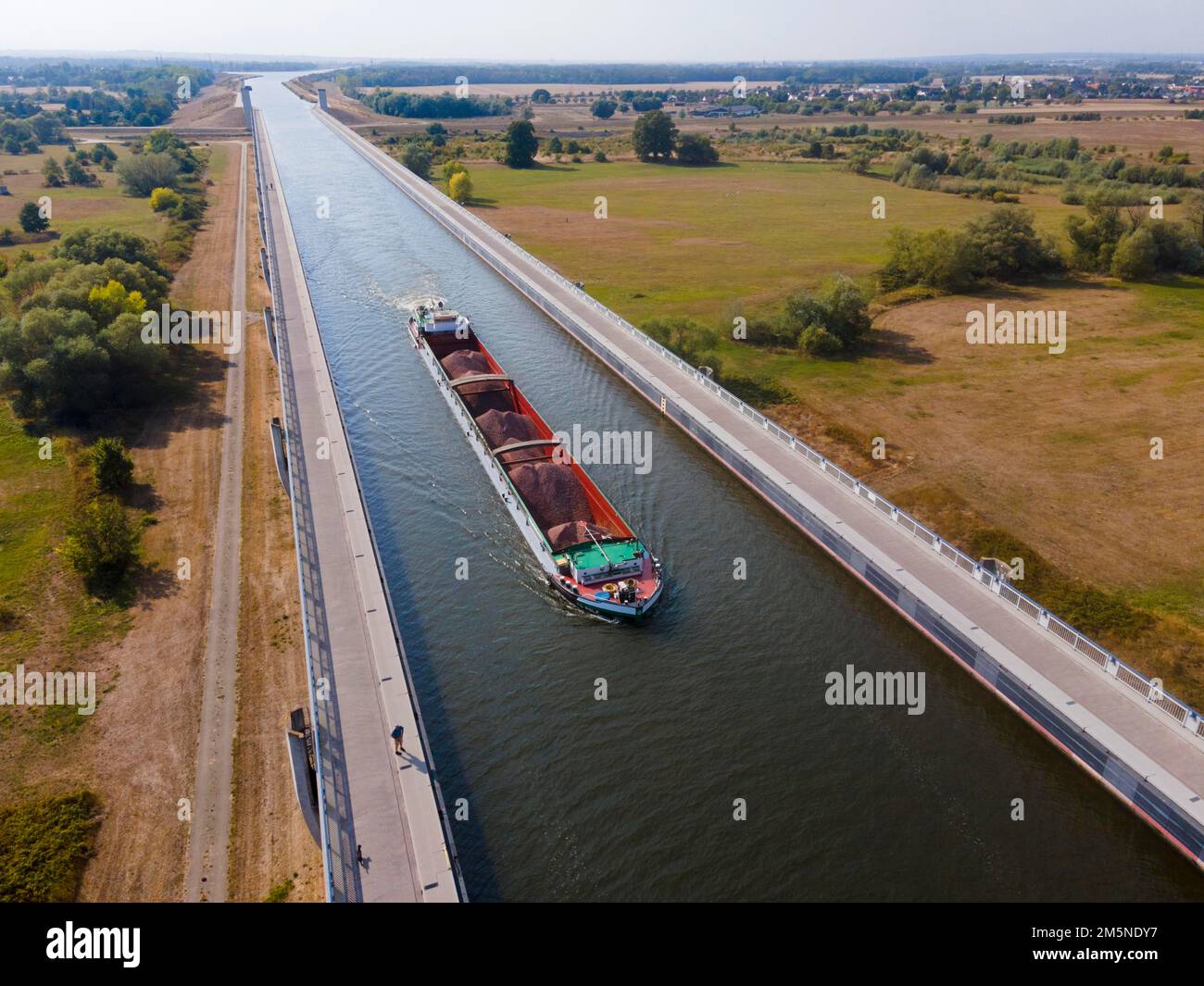 Drone shot, cargo ship on the Mittelland Canal, Magdeburg waterway ...