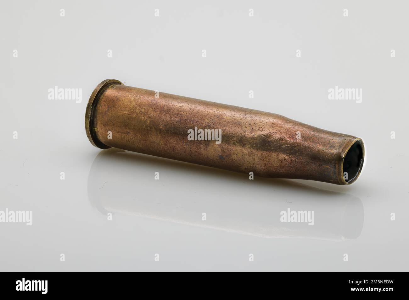Cartridge case empty in detail with reflection Stock Photo - Alamy