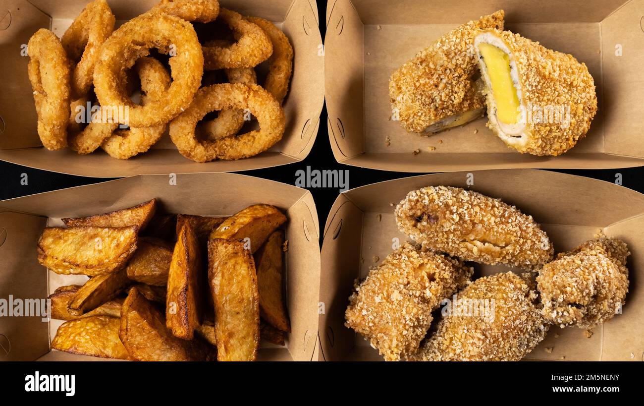 Boxes of fried fast food Stock Photo - Alamy