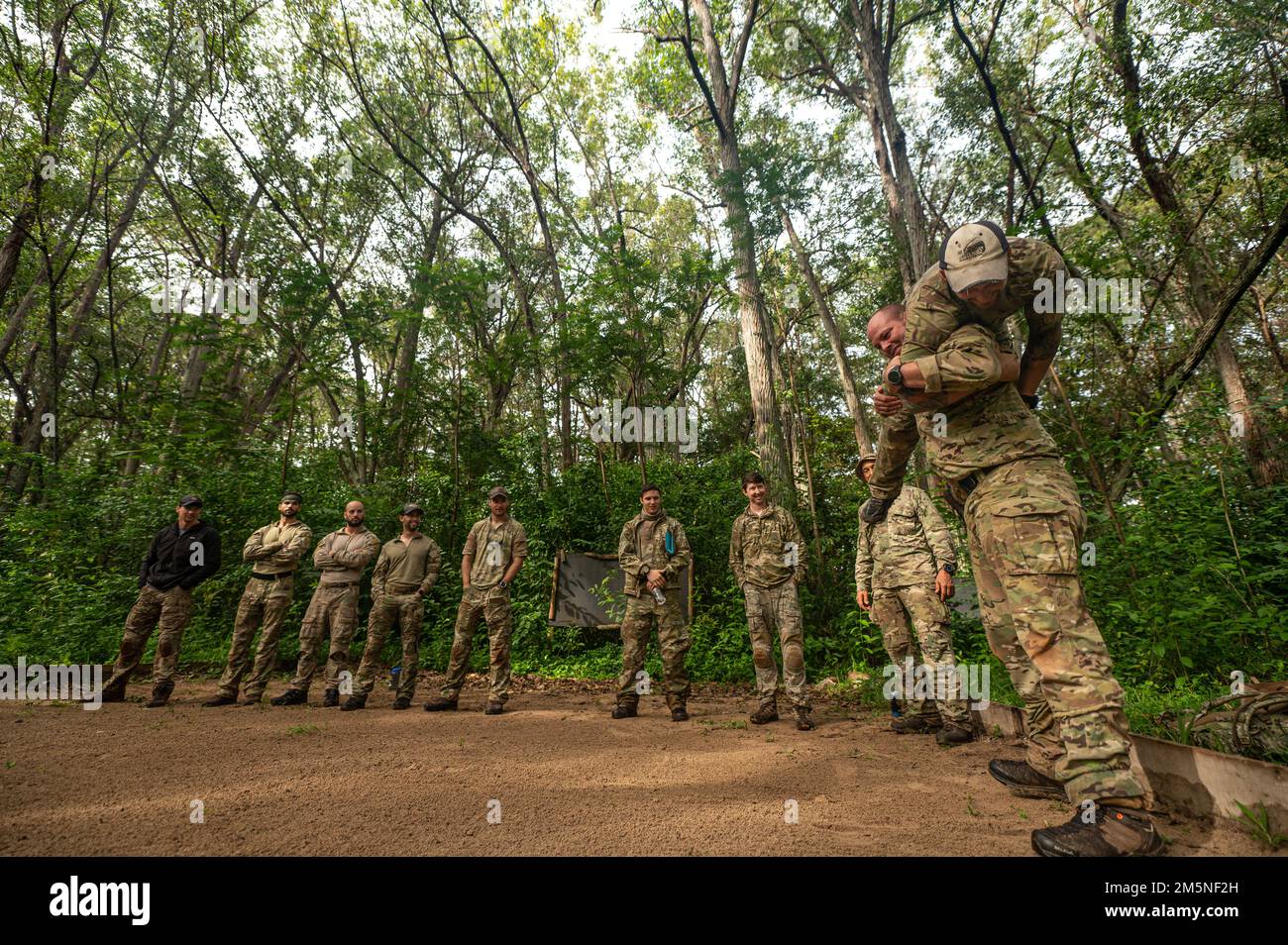 Tommy Hatrick, Tactical Tracking Operations School instructor, right ...