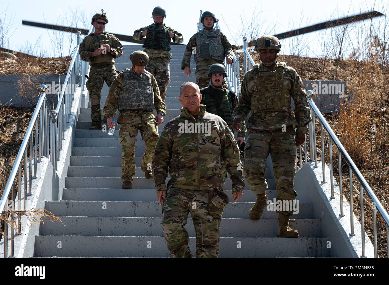 Lt. Gen. Scott L. Pleus, center, Seventh Air Force commander, arrives ...