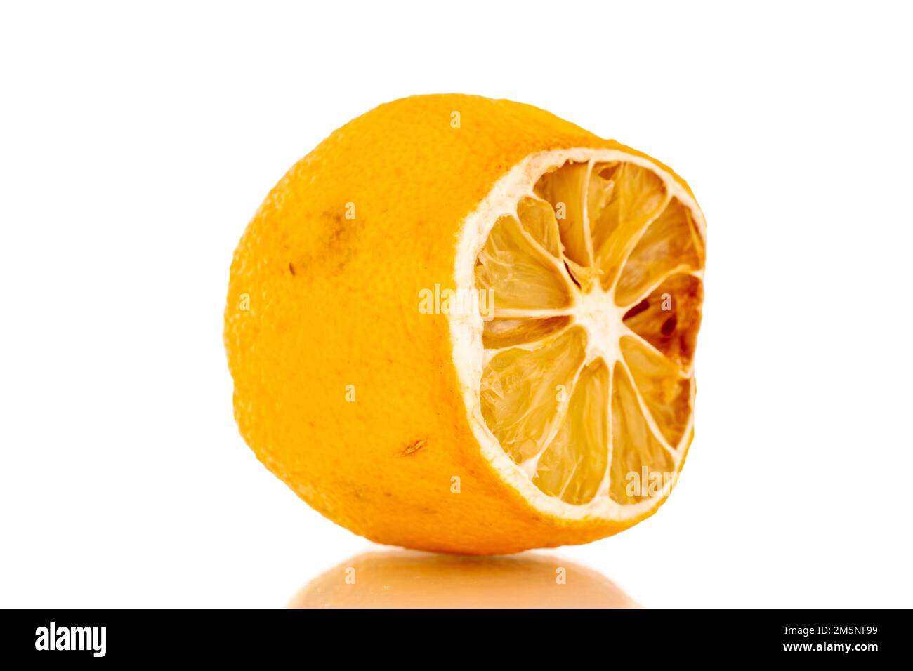 One cut dried lemon, macro, isolated on white background Stock Photo ...