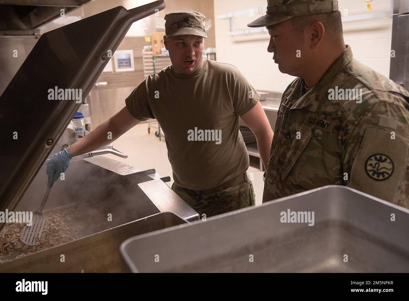 Idaho Army National Guard Spc. Anthony Bassett talks with Staff Sgt ...
