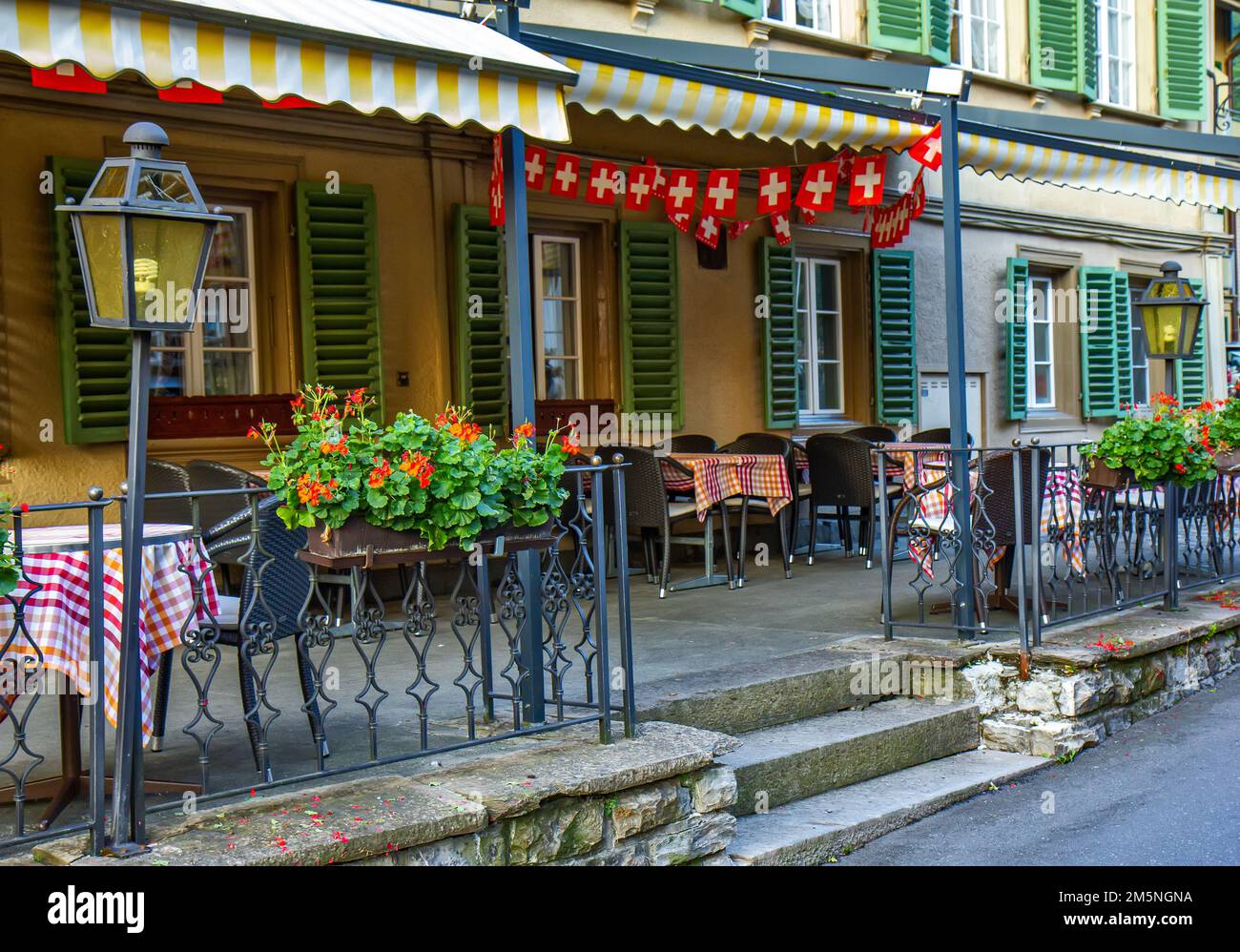 Small restaurant in traditional village in Switzerland Alps Stock Photo ...