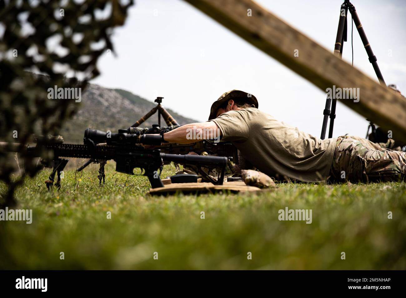 A U.S. Navy SEAL from Naval Special Warfare Group 2 prepares his sniper ...