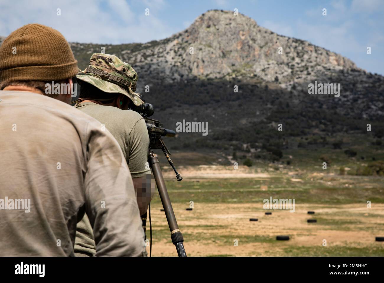 A U.S. Navy SEAL from Naval Special Warfare Group 2 finds a target with ...