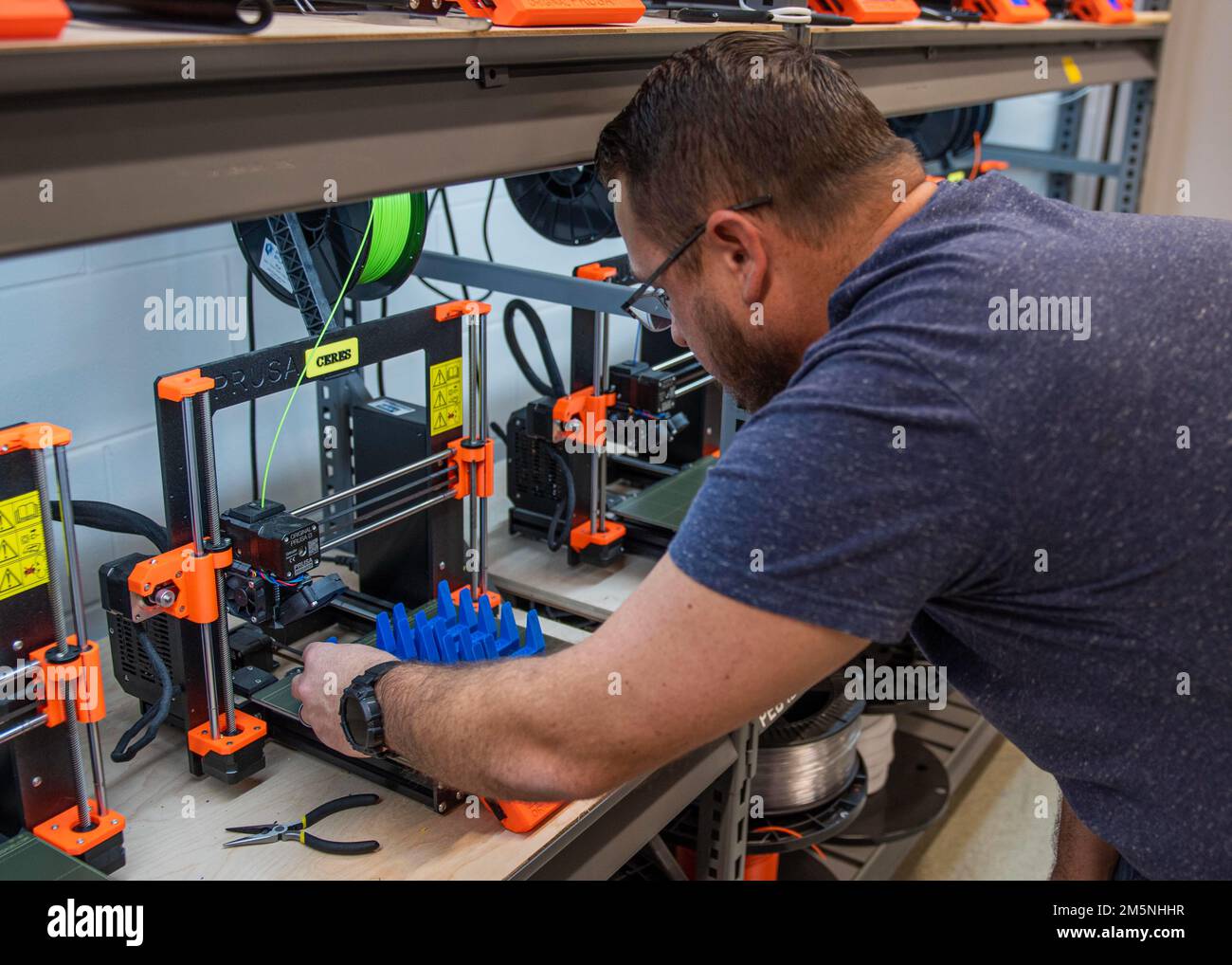 Laptop lifter hi-res stock photography and images - Alamy