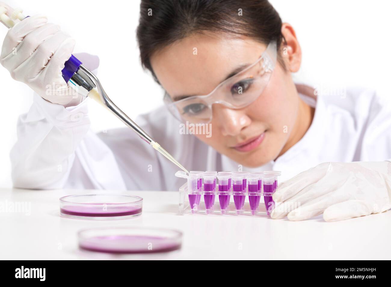 The reagent women scientists observed in vitro Stock Photo - Alamy