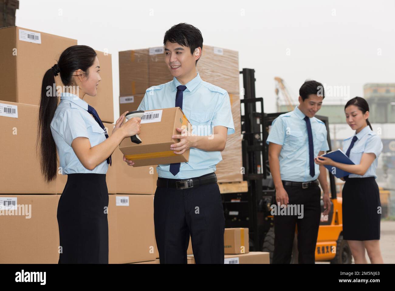 Scan cargo logistics warehouse management personnel Stock Photo - Alamy