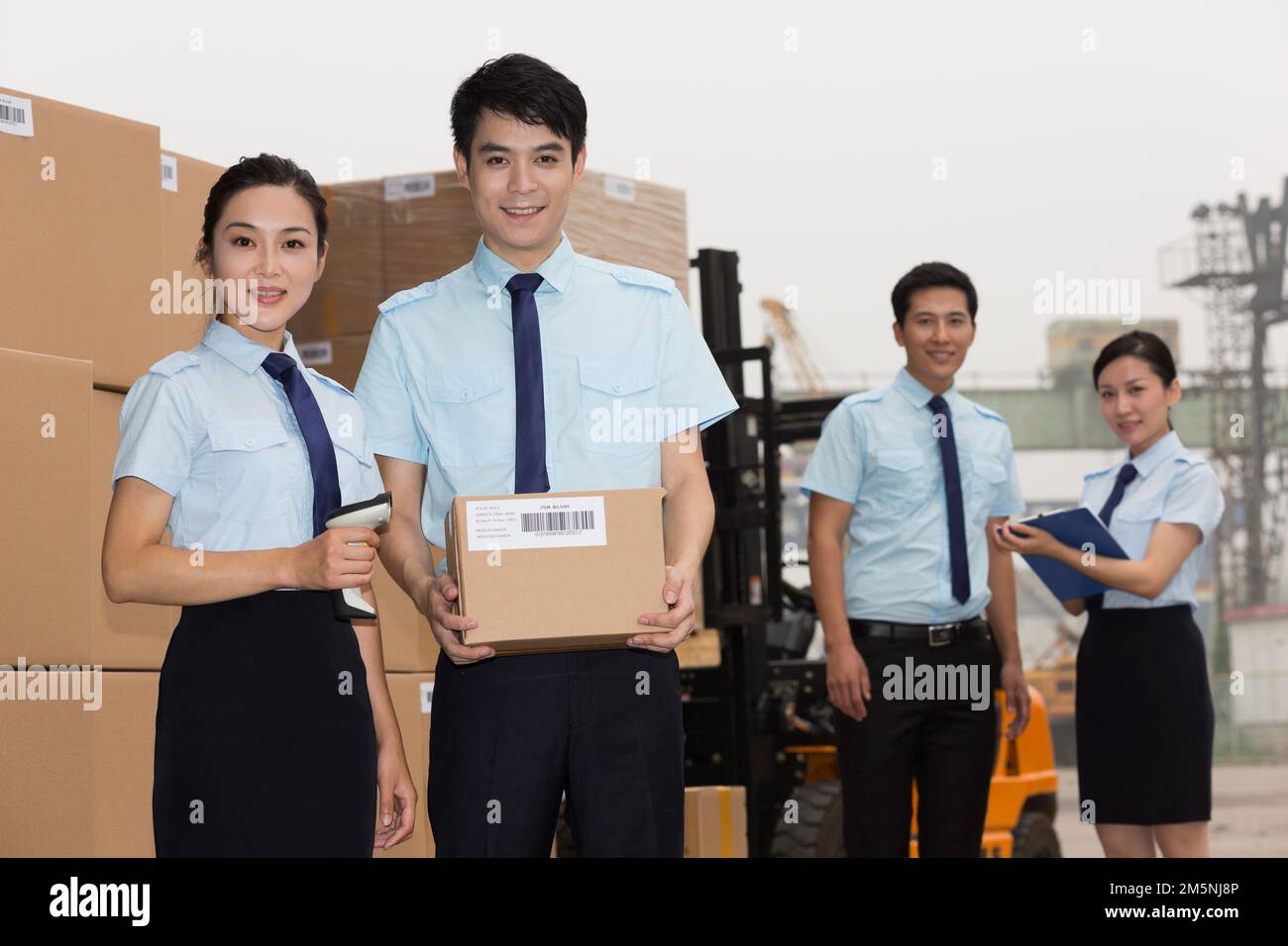Scan cargo logistics warehouse management personnel Stock Photo - Alamy