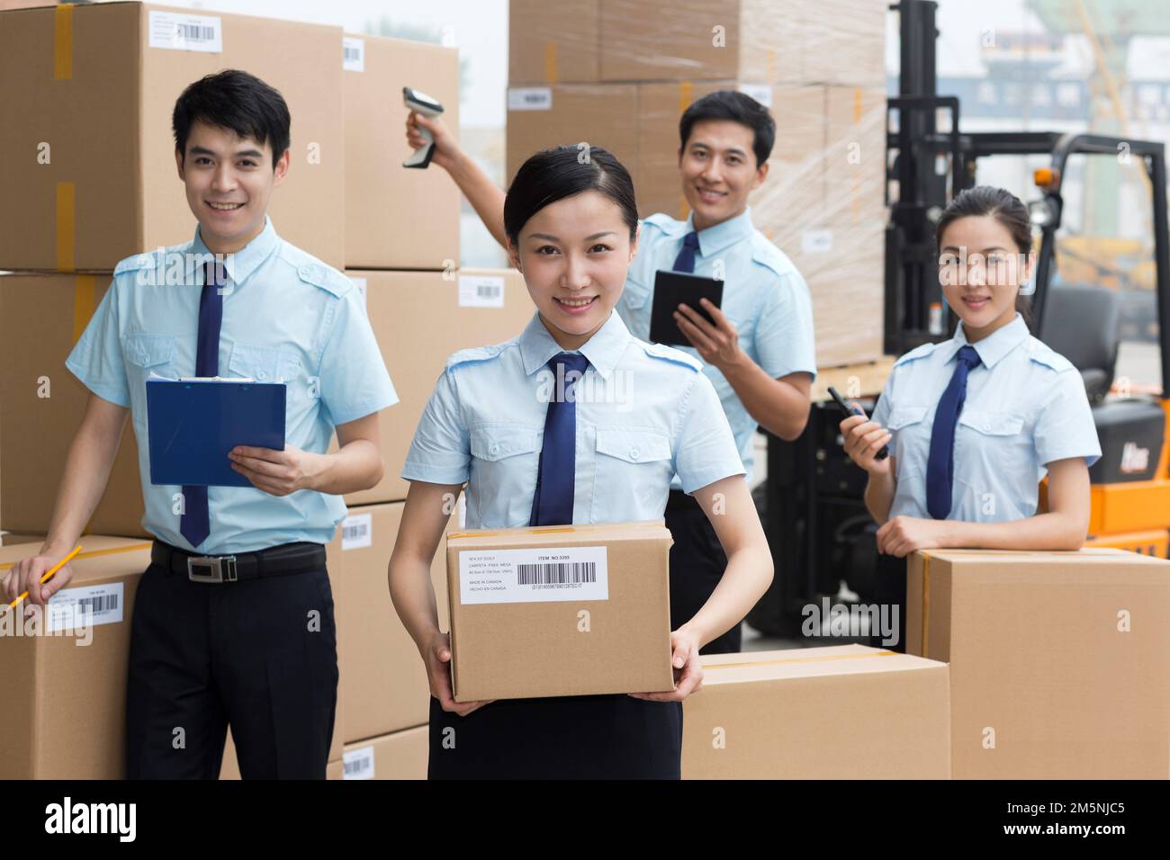 Logistics warehouse management team Stock Photo - Alamy