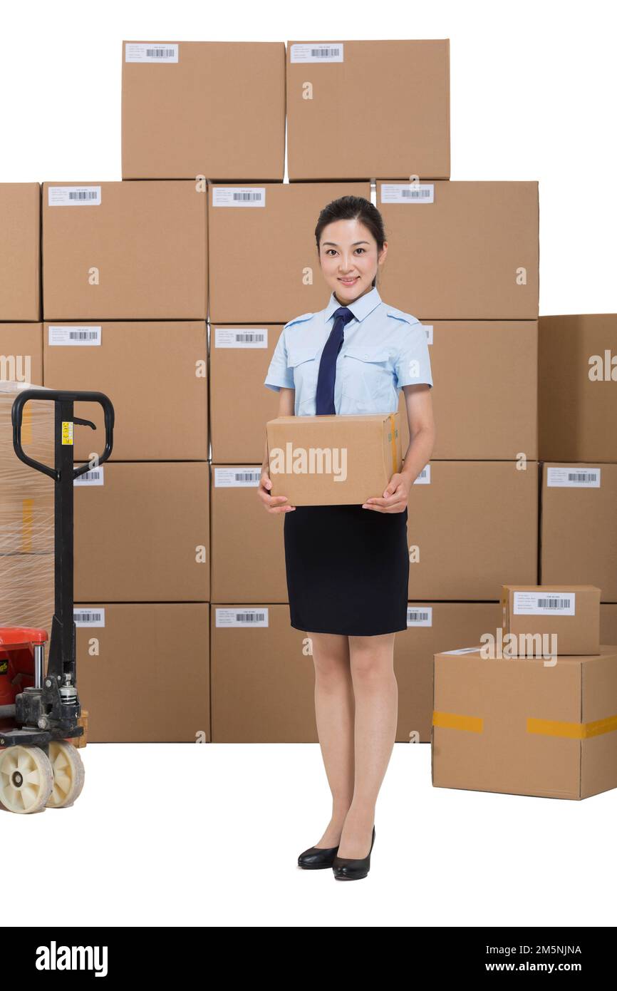 Logistics warehouse staff holding the carton Stock Photo - Alamy
