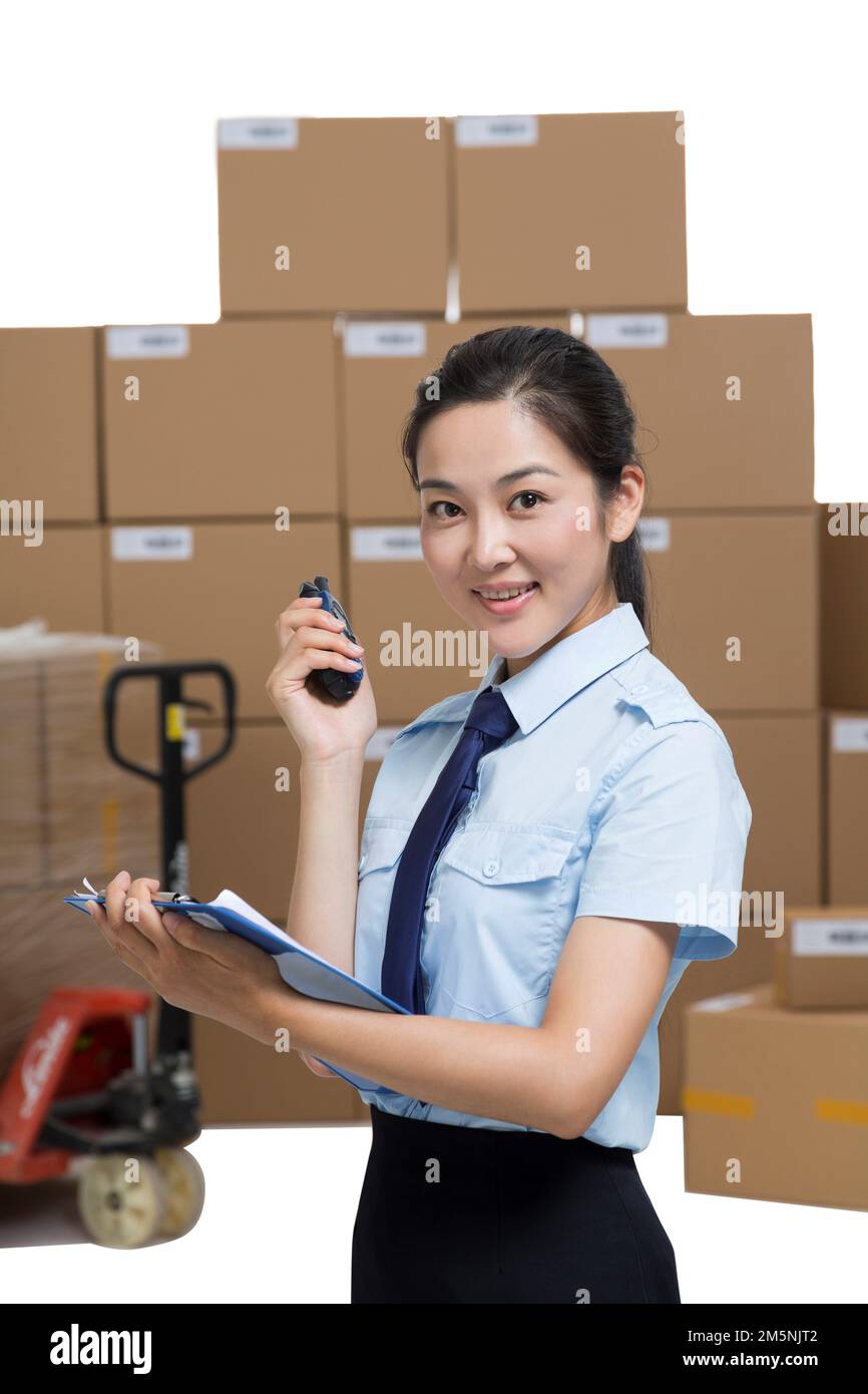 Logistics warehouse staff hand interphone Stock Photo - Alamy
