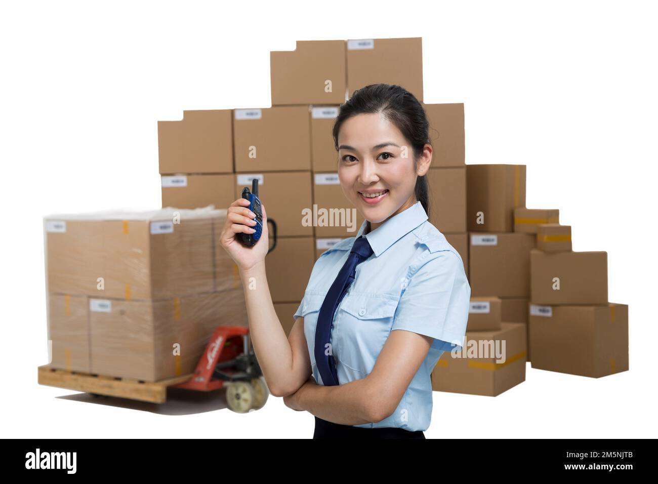 Logistics warehouse staff hand interphone Stock Photo - Alamy