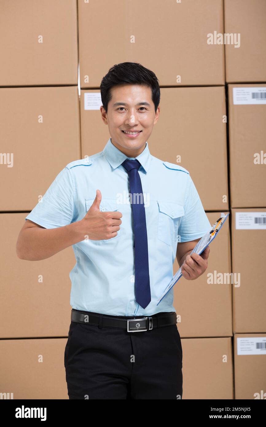 Logistics warehouse staff Stock Photo - Alamy