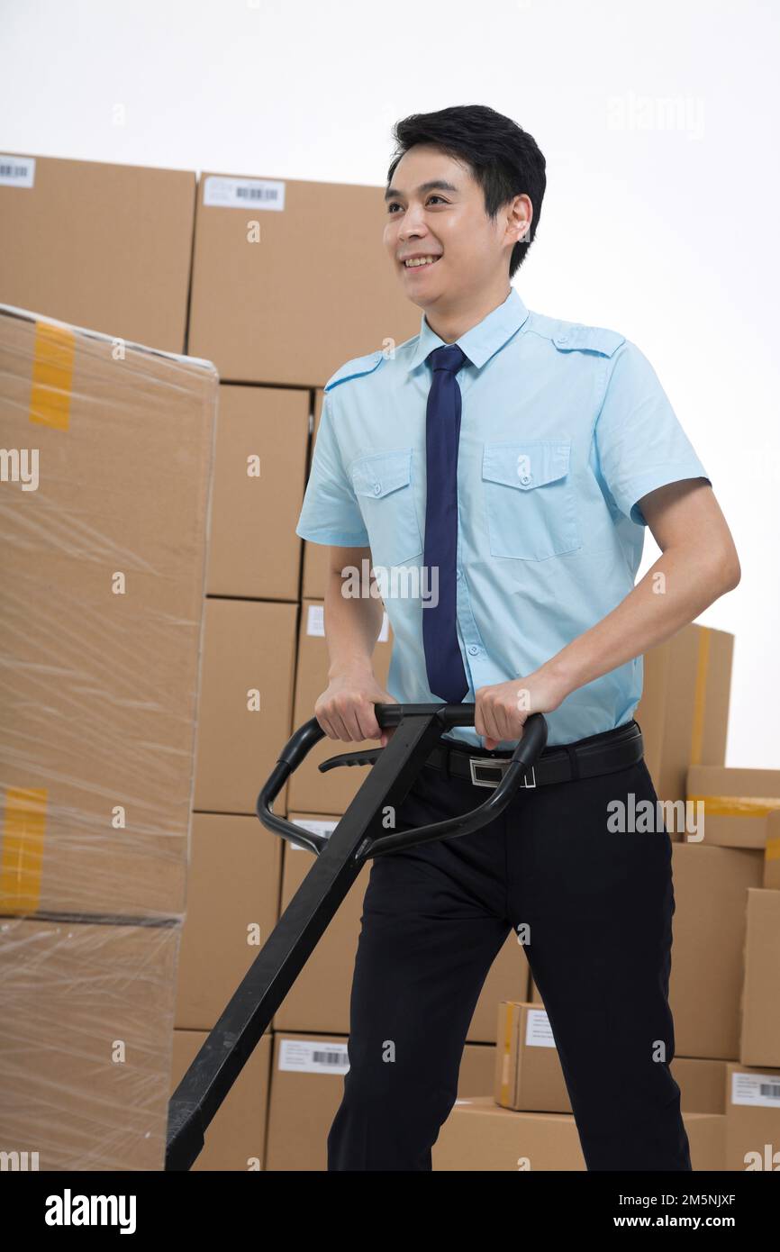 Warehouse pushing trolley hi-res stock photography and images - Alamy