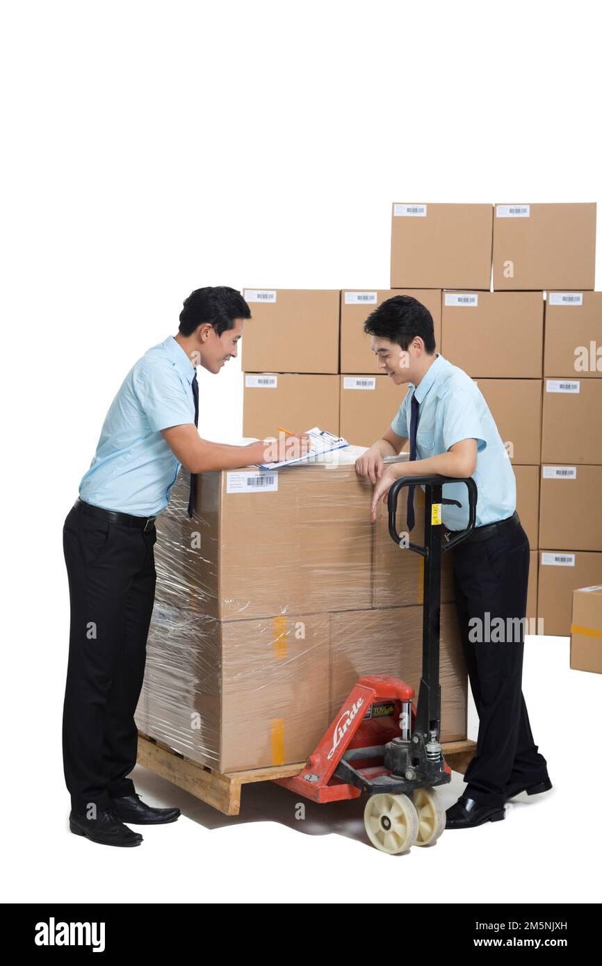 Logistics warehouse personnel in the inspection of goods Stock Photo ...